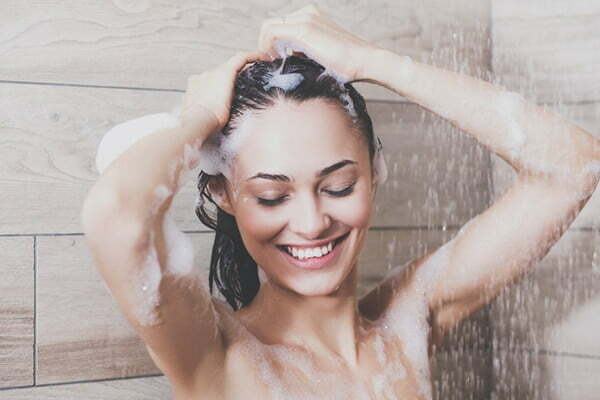 Should You Use Shampoo Or Conditioner First? Here's The Right Way To Do ...